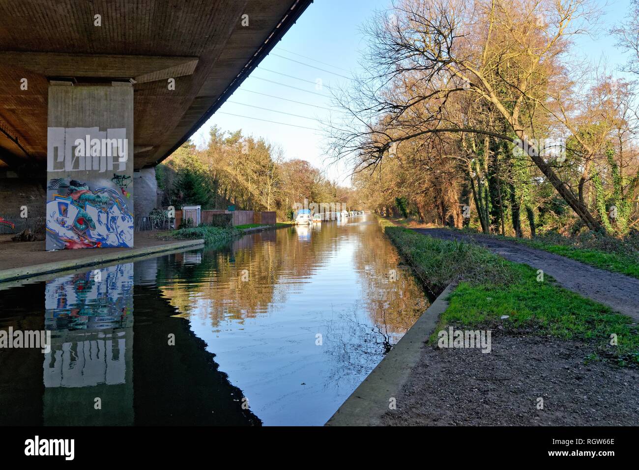 The River Wey navigation and canal at New Haw on a sunny winters day ...