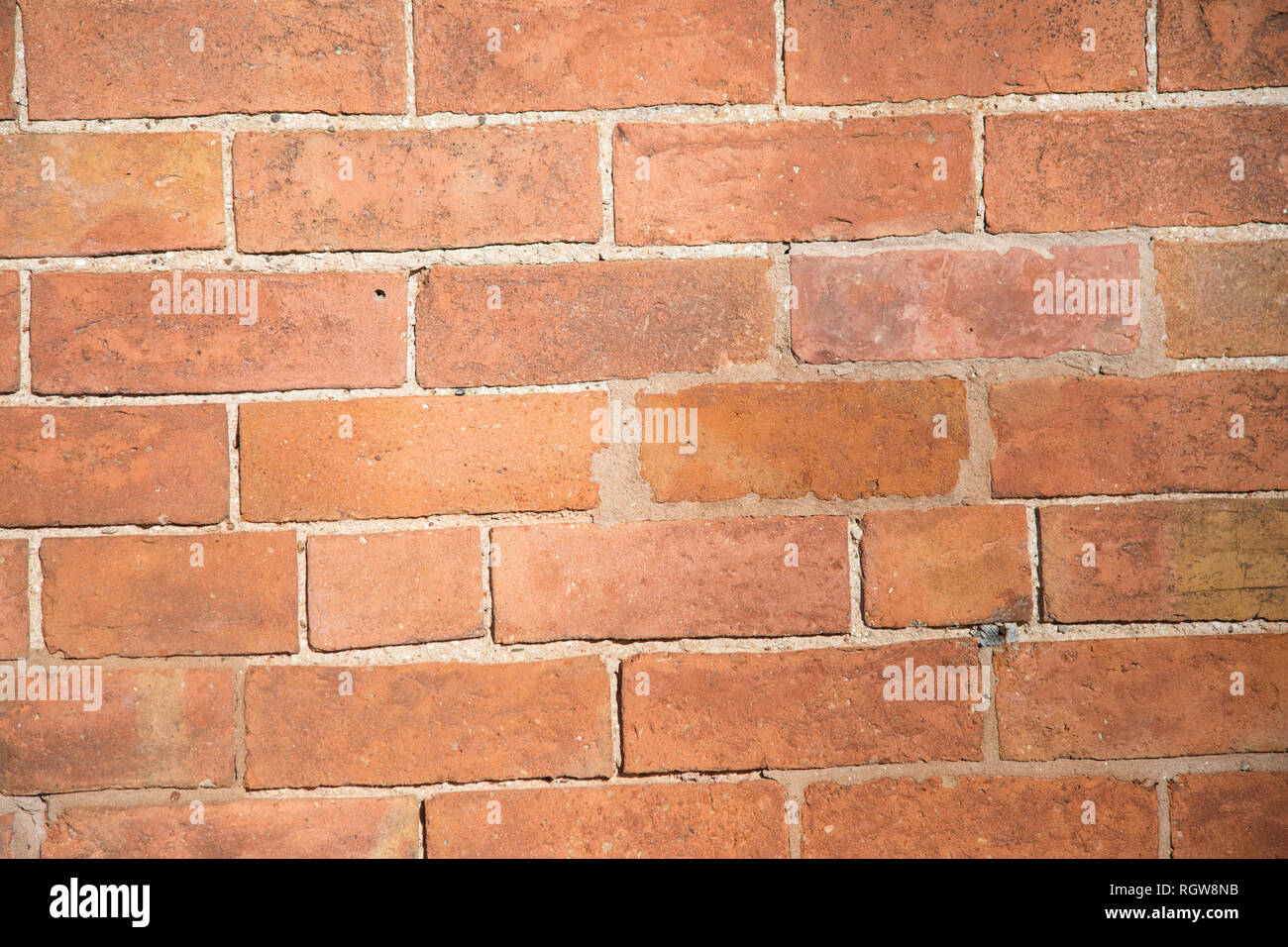 Brick wall, orange bricks in an old brick wall nothing but bricks ...