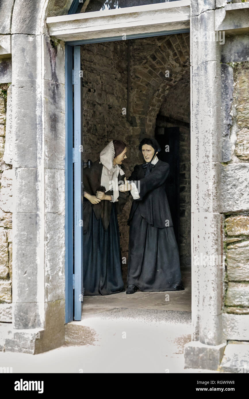 Models of female prisioner and warder in entrance to Cork City Gaol ...