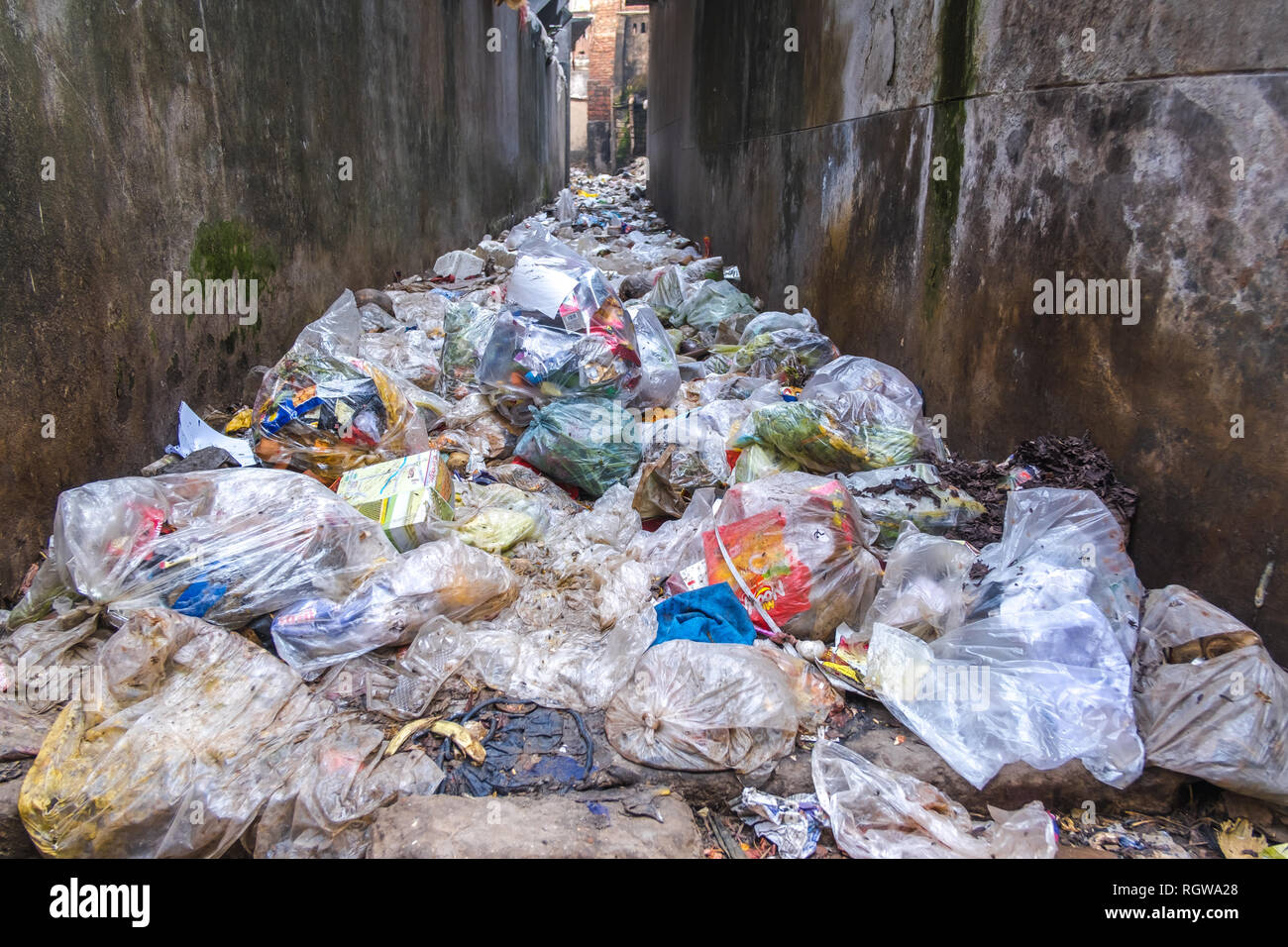 Garbage and plastic pollution in small alley in Narayanganj near Dhaka ...