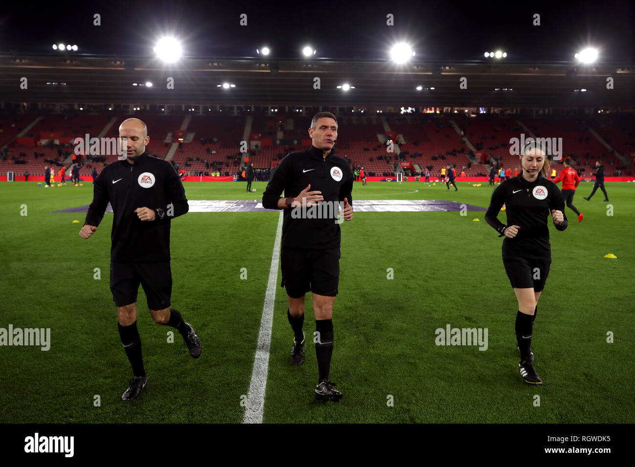 Referee Andre Marriner (centre) and assistants Simon Long and Sian ...