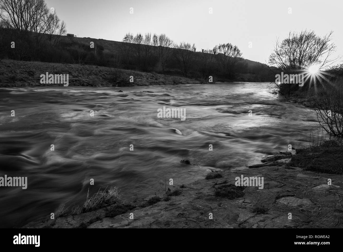 Long river sunset Black and White Stock Photos & Images - Alamy