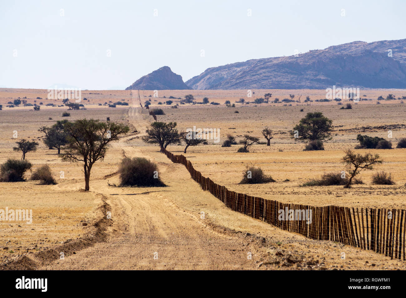 wilderness Desert fence namibia desert mountainsa Stock Photo - Alamy