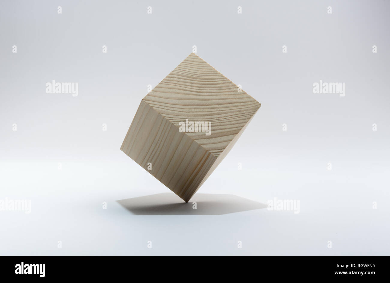 Abstract geometric real wooden cube on gray background with real shadow ...