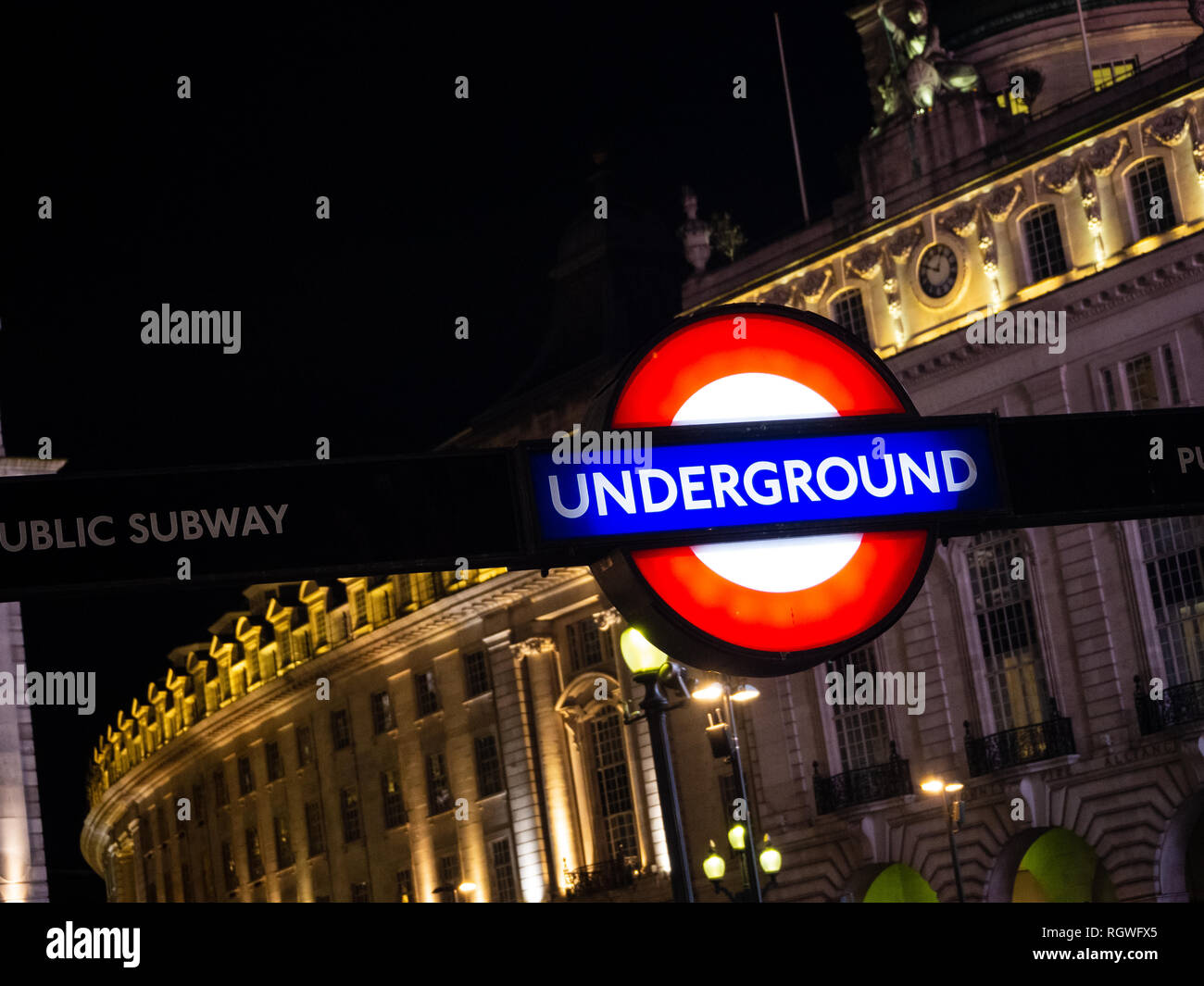 Low angle view of an illuminated London Underground tube station sign ...