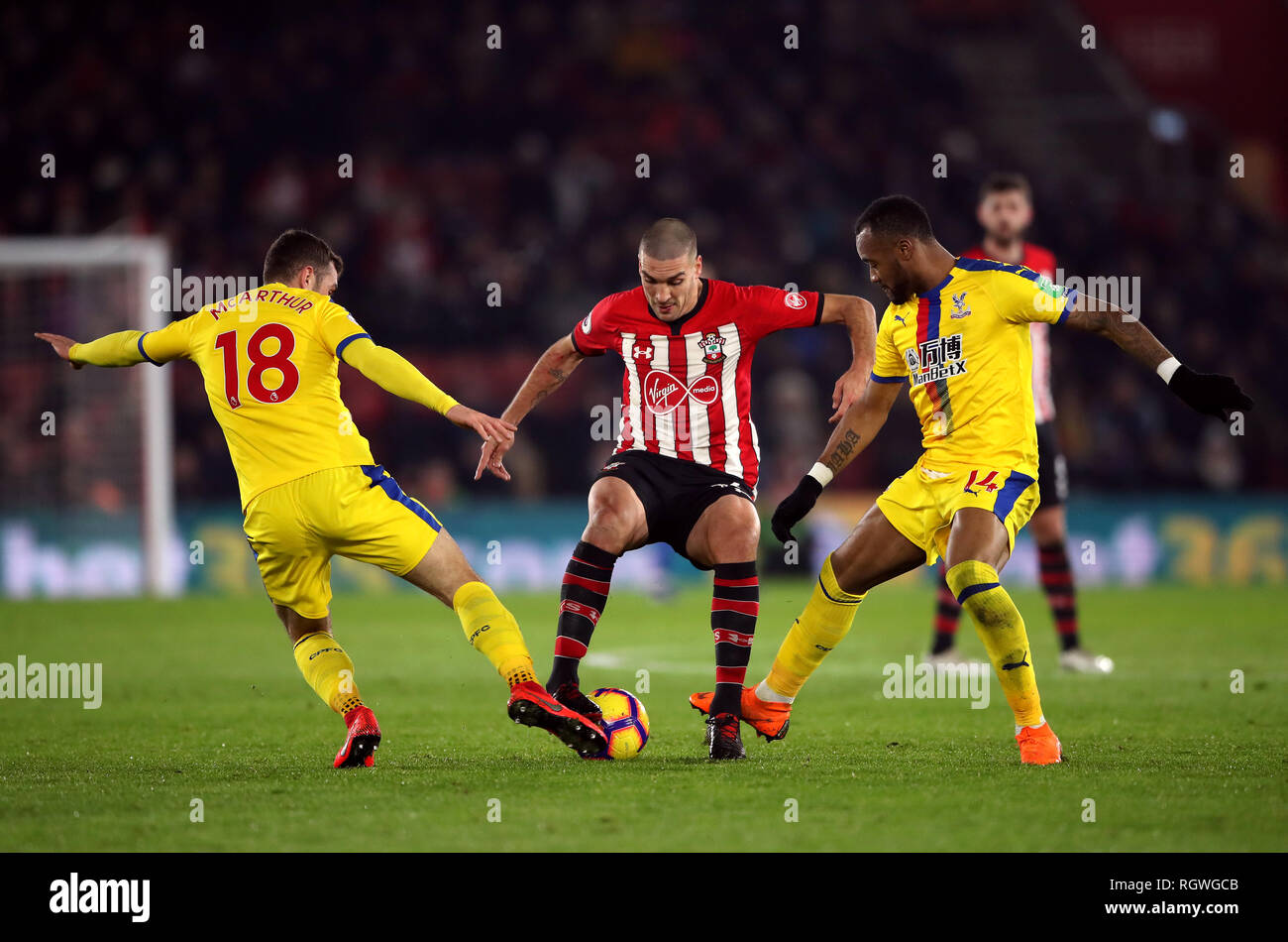 Southampton's Oriol Romeu (centre) battles for the ball with Crystal ...