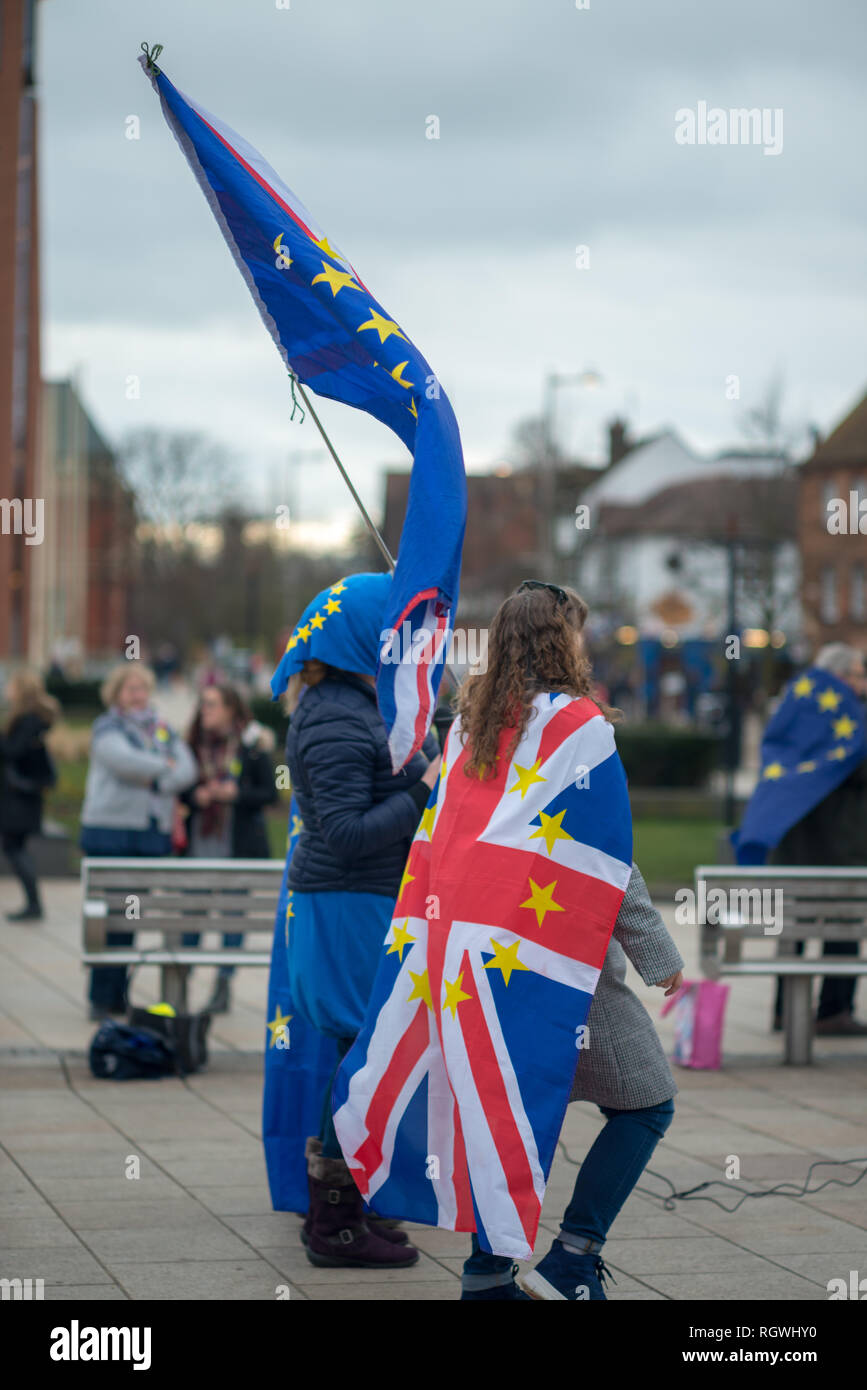 Two women wave and wear EU and UK flags at anti Brexit protest Stock ...