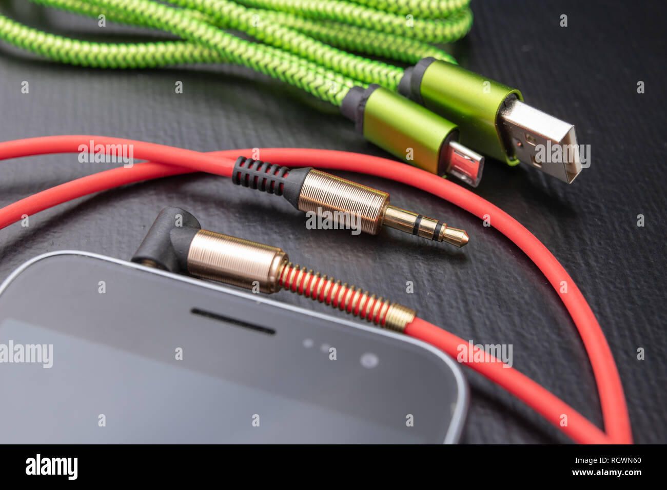 Jack and usb cable for smartphone. Telephone and accessories on the ...