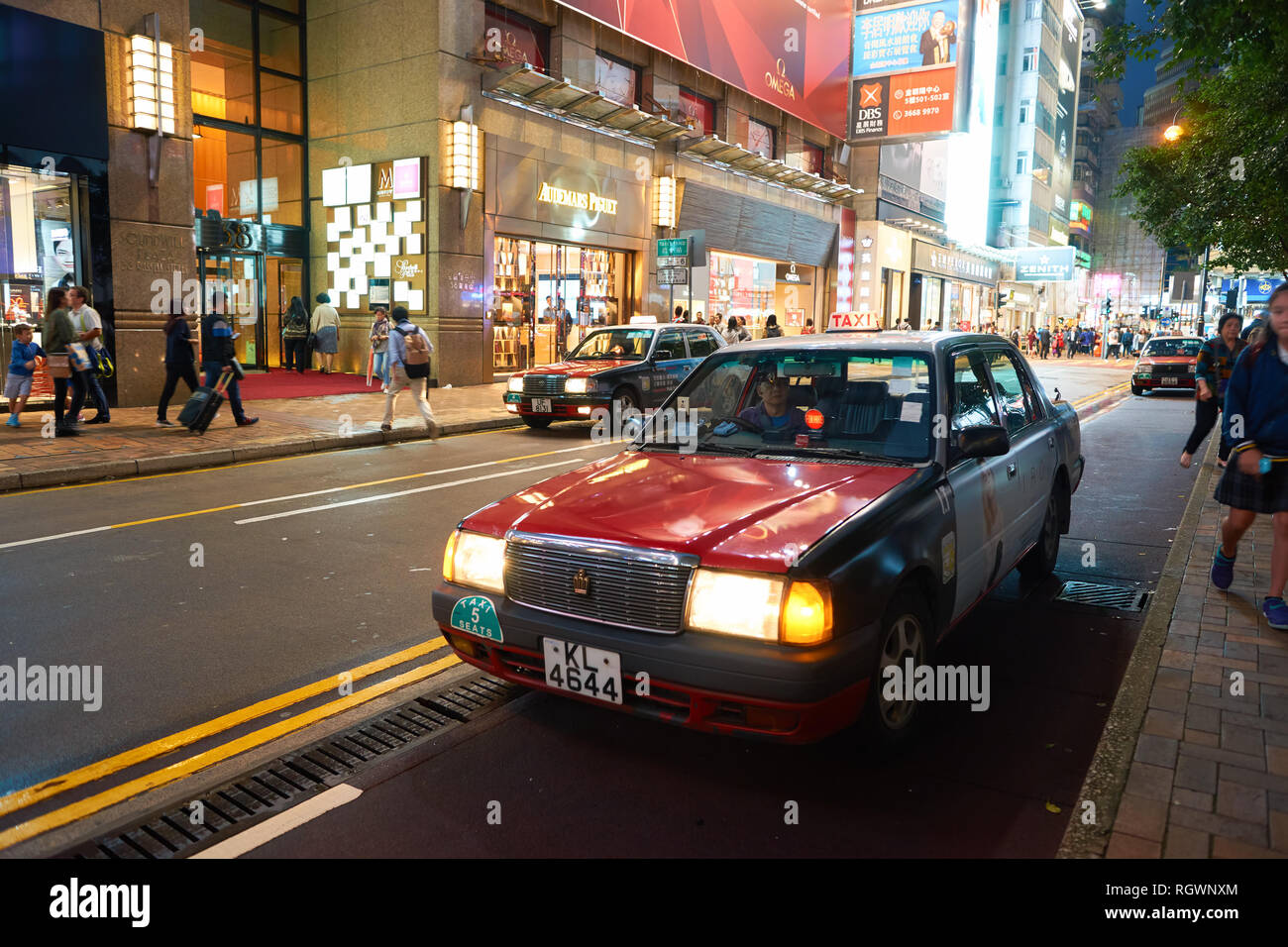 HONG KONG - CIRCA NOVEMBER, 2016: urban red taxi in Hong Kong urban ...