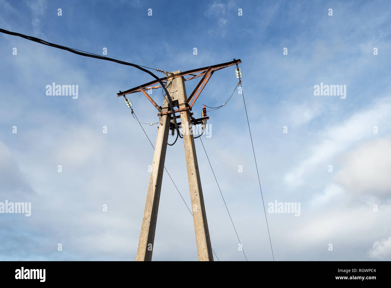 Old electrical pylon. Vintage high voltage pylon. Electricity concept ...