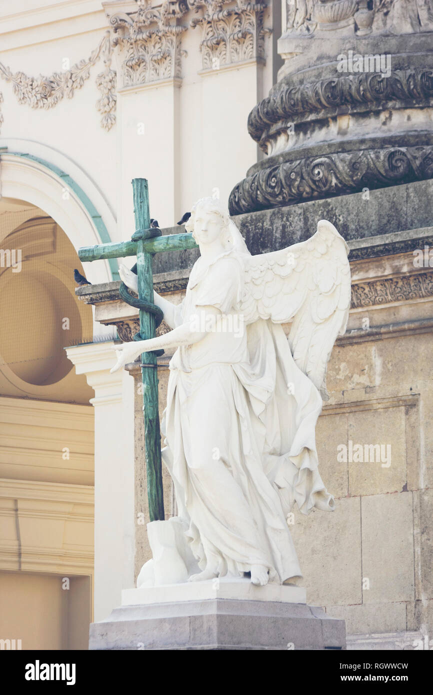 Roman statue with a cross Stock Photo - Alamy