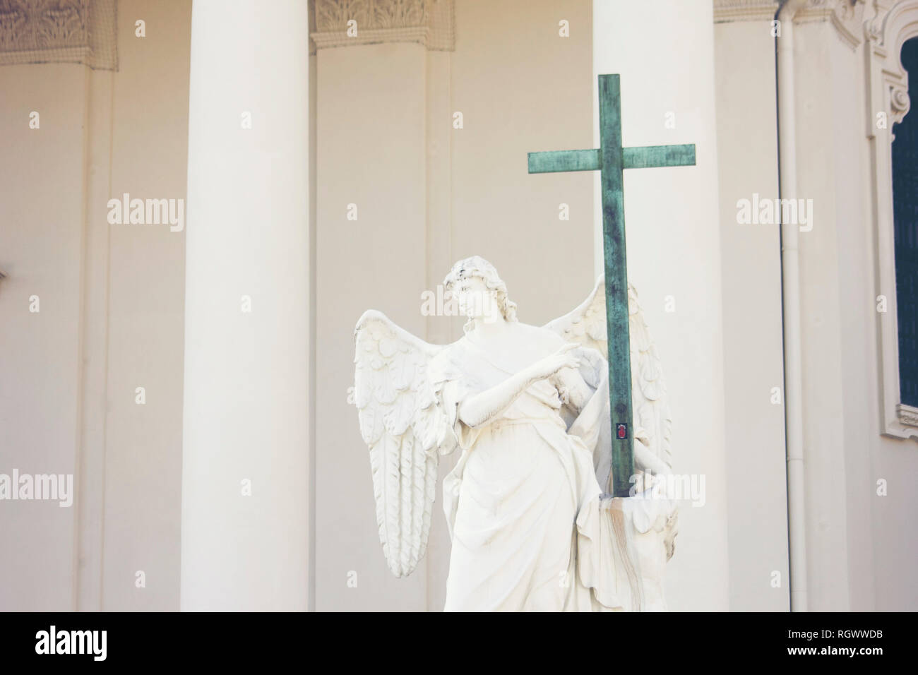 Roman statue with a cross Stock Photo - Alamy
