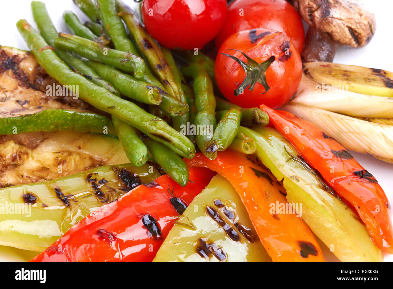 grilled vegetables on a white background Stock Photo - Alamy