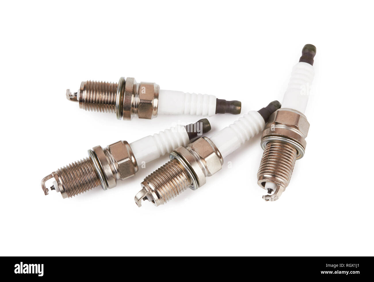 Spark plugs isolated on a white background Stock Photo - Alamy
