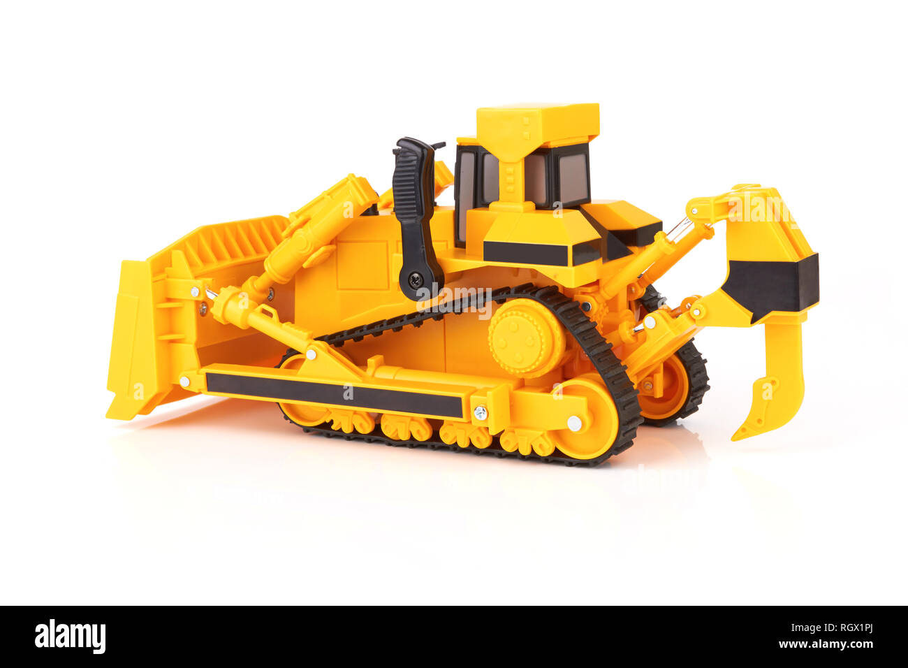 Toy yellow bulldozer on a white background Stock Photo - Alamy