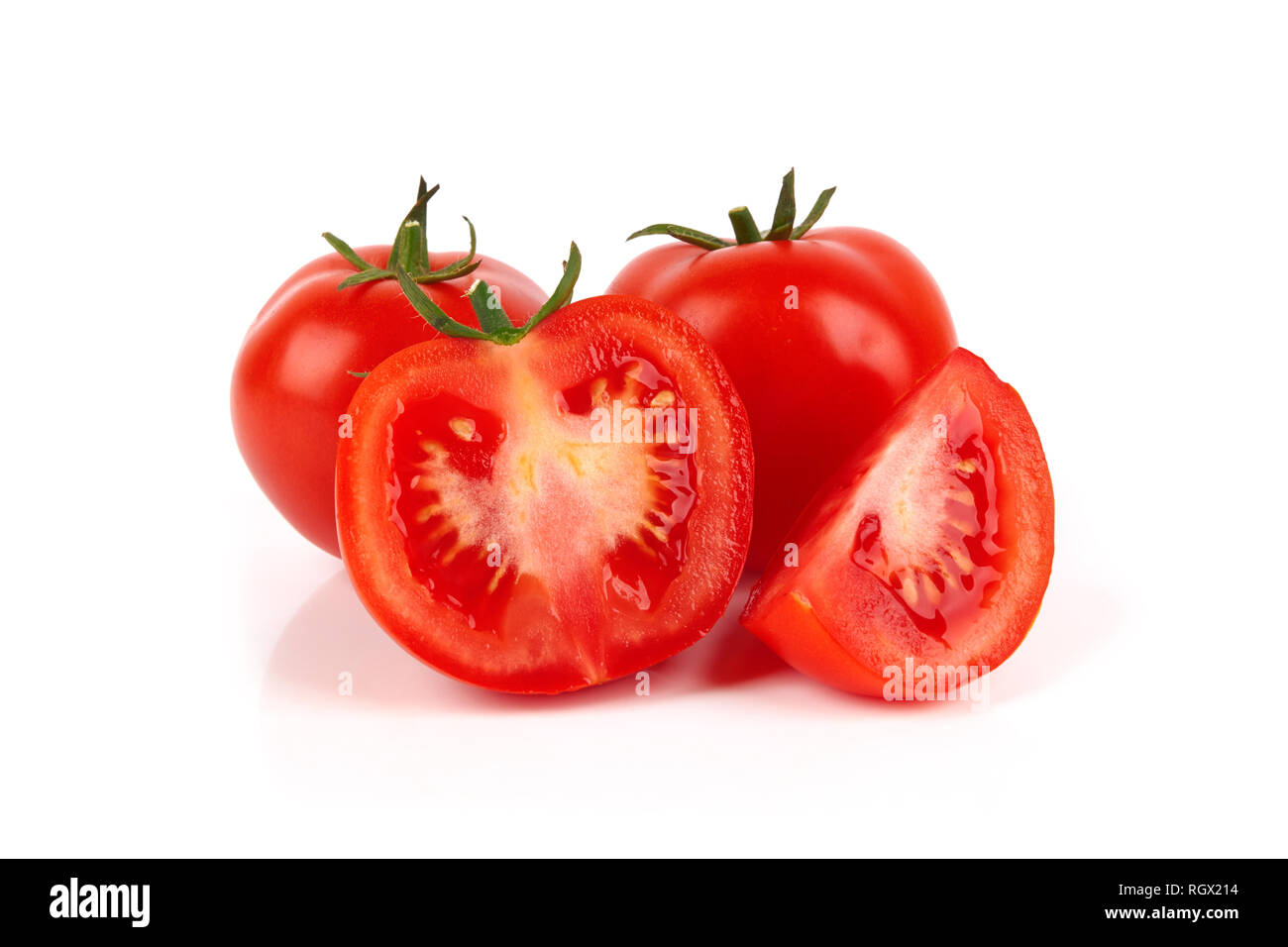 Pile of fresh tomatoes isolated on white background Stock Photo - Alamy