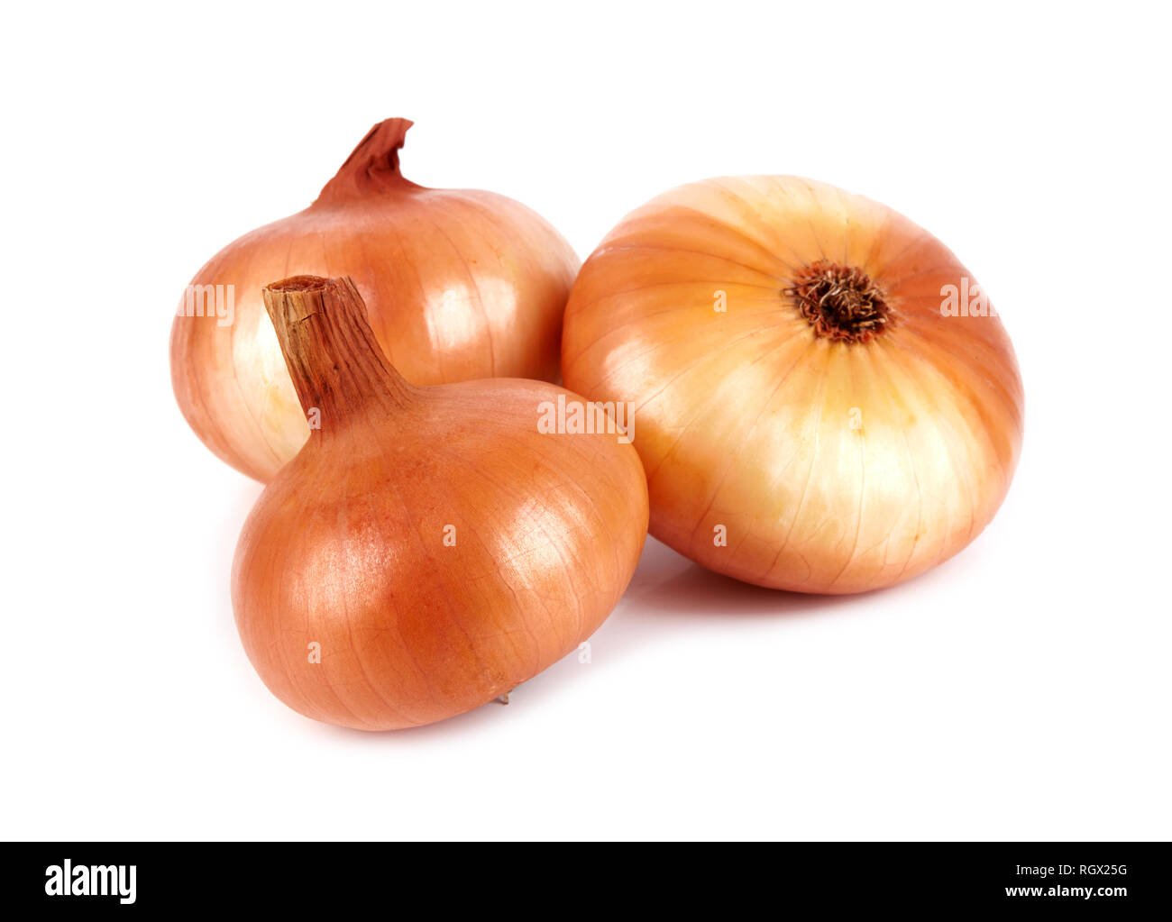 Gold onion bulbs isolated on white background Stock Photo - Alamy