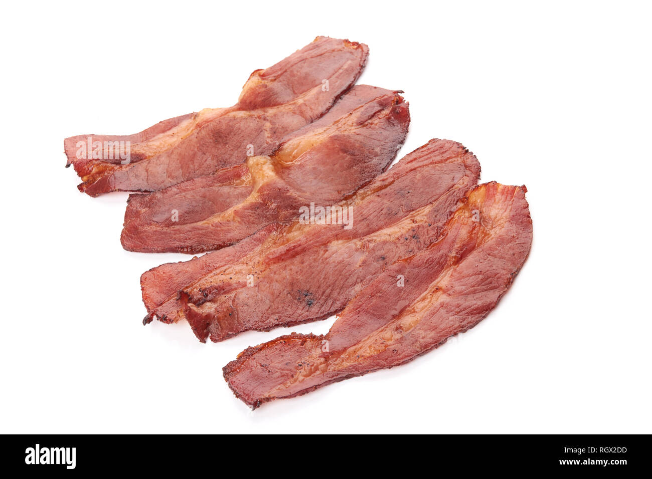 cooked slices of bacon isolated on white background Stock Photo - Alamy