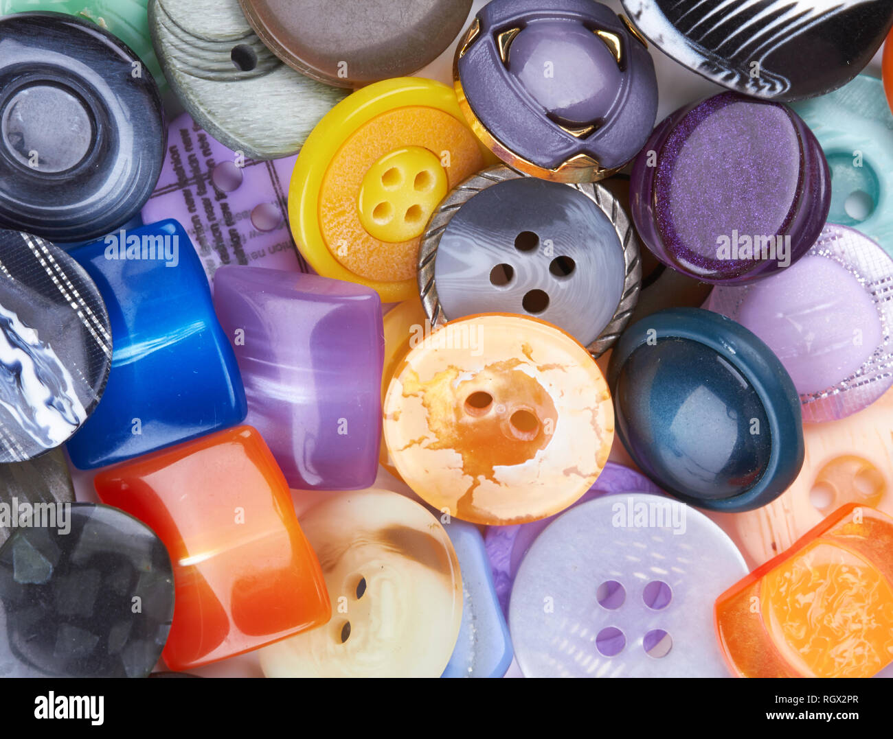 Sewing buttons as a background Stock Photo - Alamy