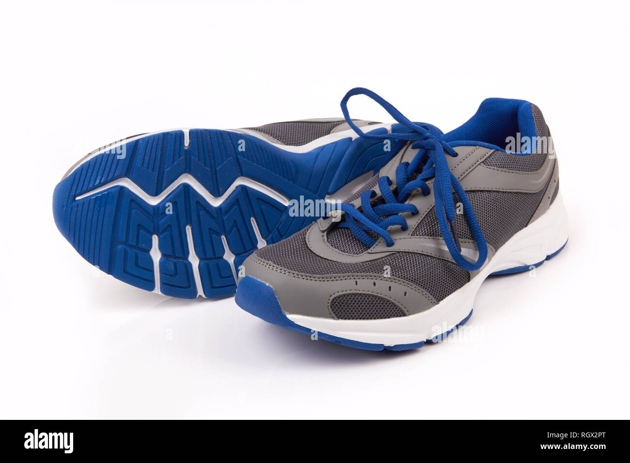 pair of running shoes over a white background Stock Photo - Alamy