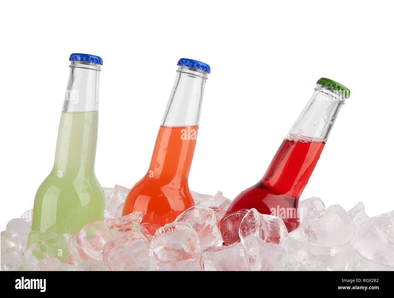 Three bottles in ice isolated on white background Stock Photo - Alamy