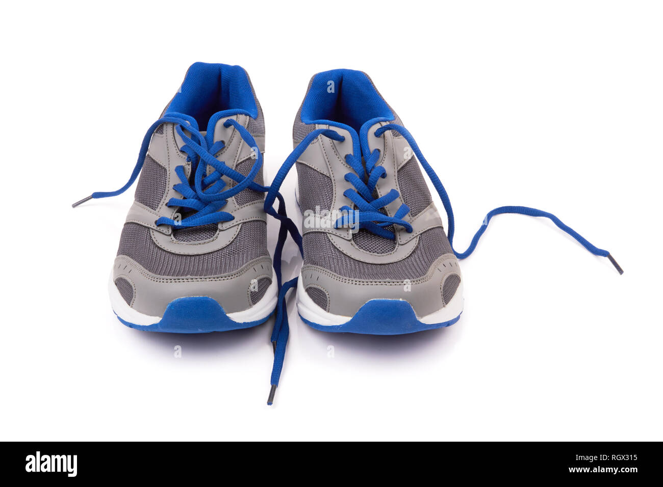 pair of running shoes over a white background Stock Photo - Alamy