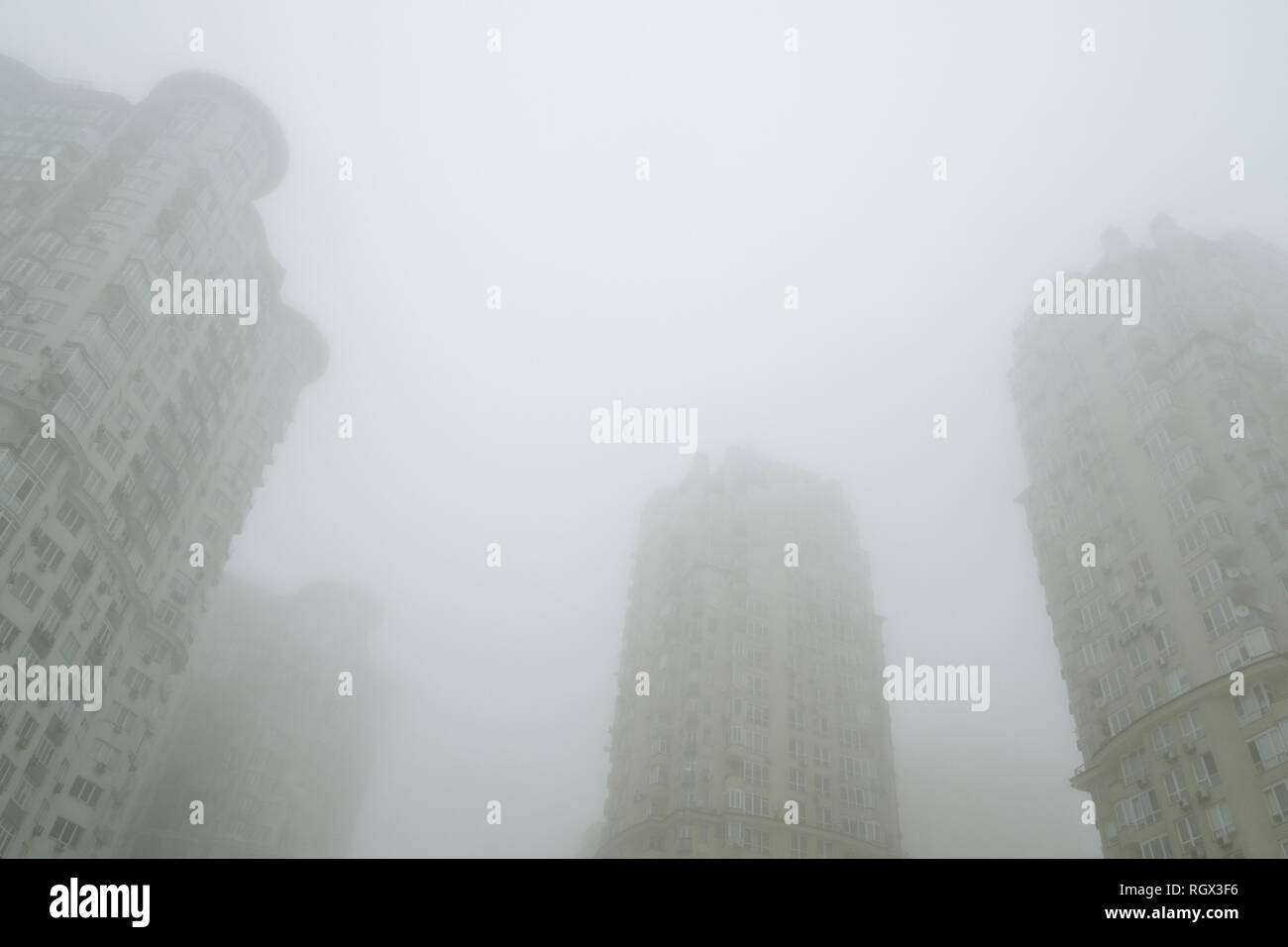 Foggy Ñ ityscape scene. Fog on the city street. Modern high-rise ...