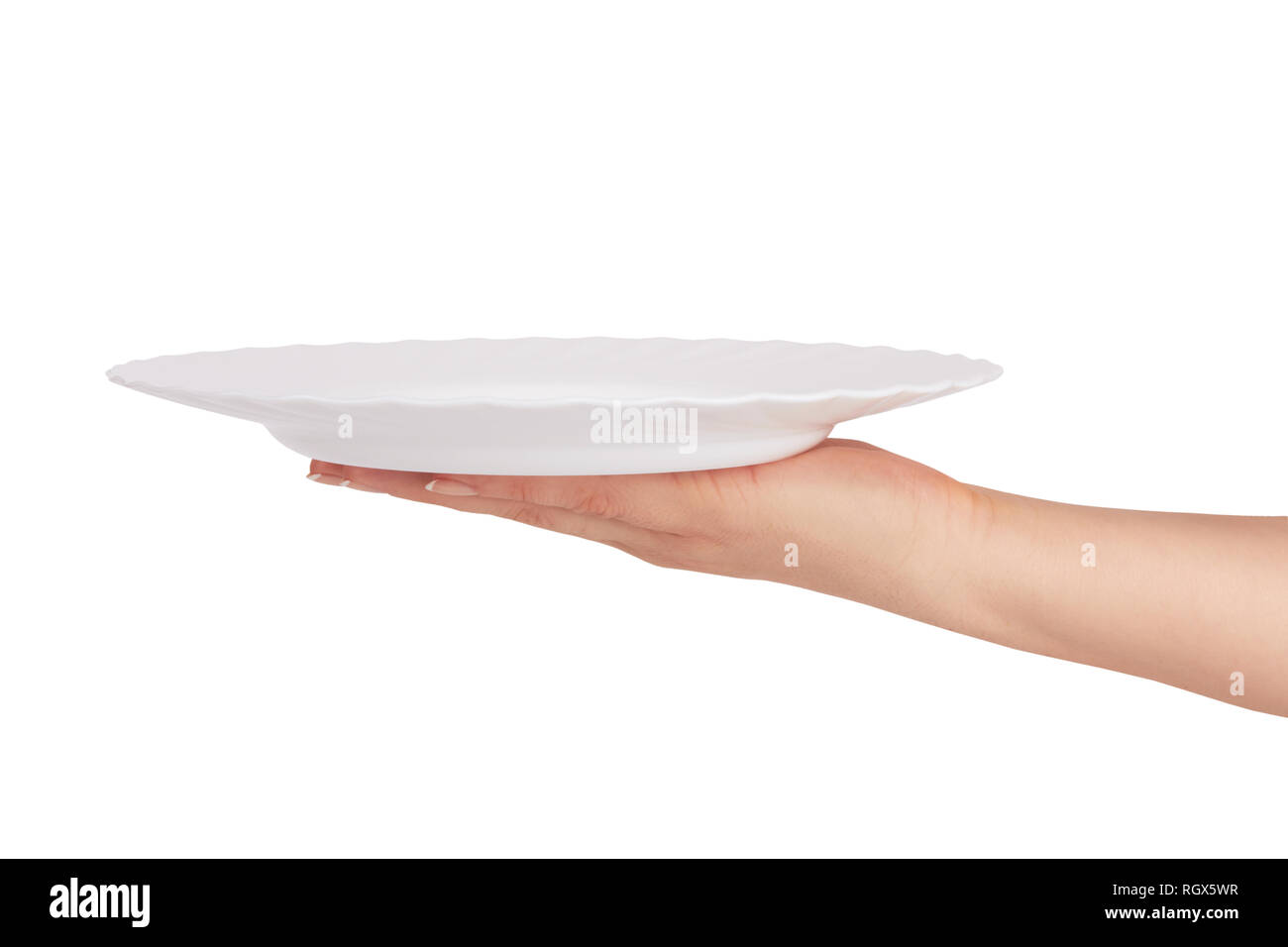white kitchen plate on woman hand on white background Stock Photo - Alamy