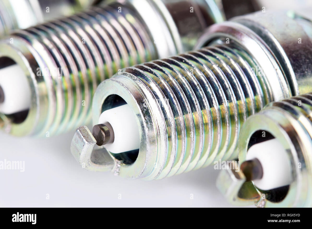 Set of spark plugs for the car on a white background Stock Photo - Alamy