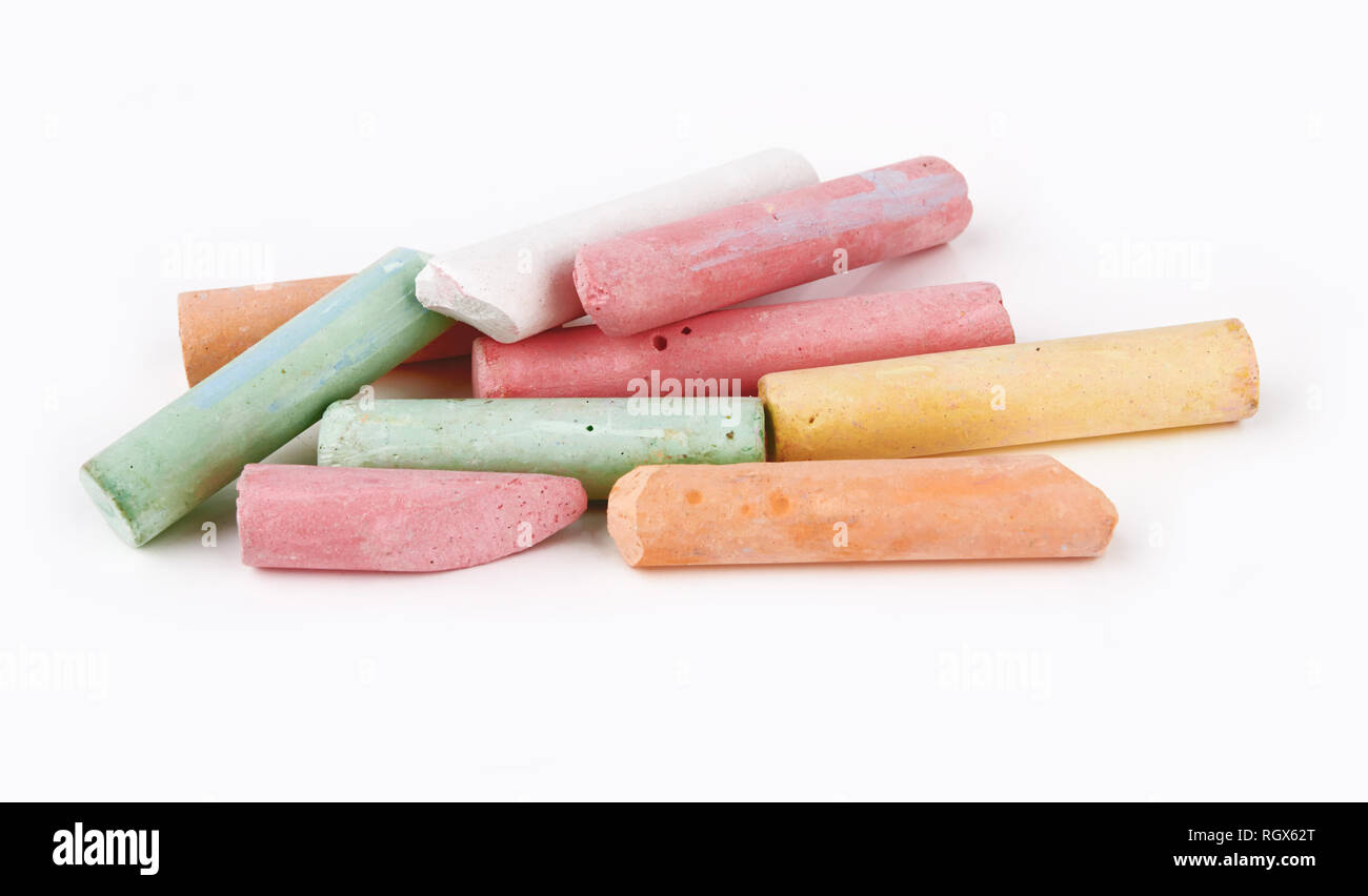 broken pieces of colored chalk isolated on white background Stock Photo ...