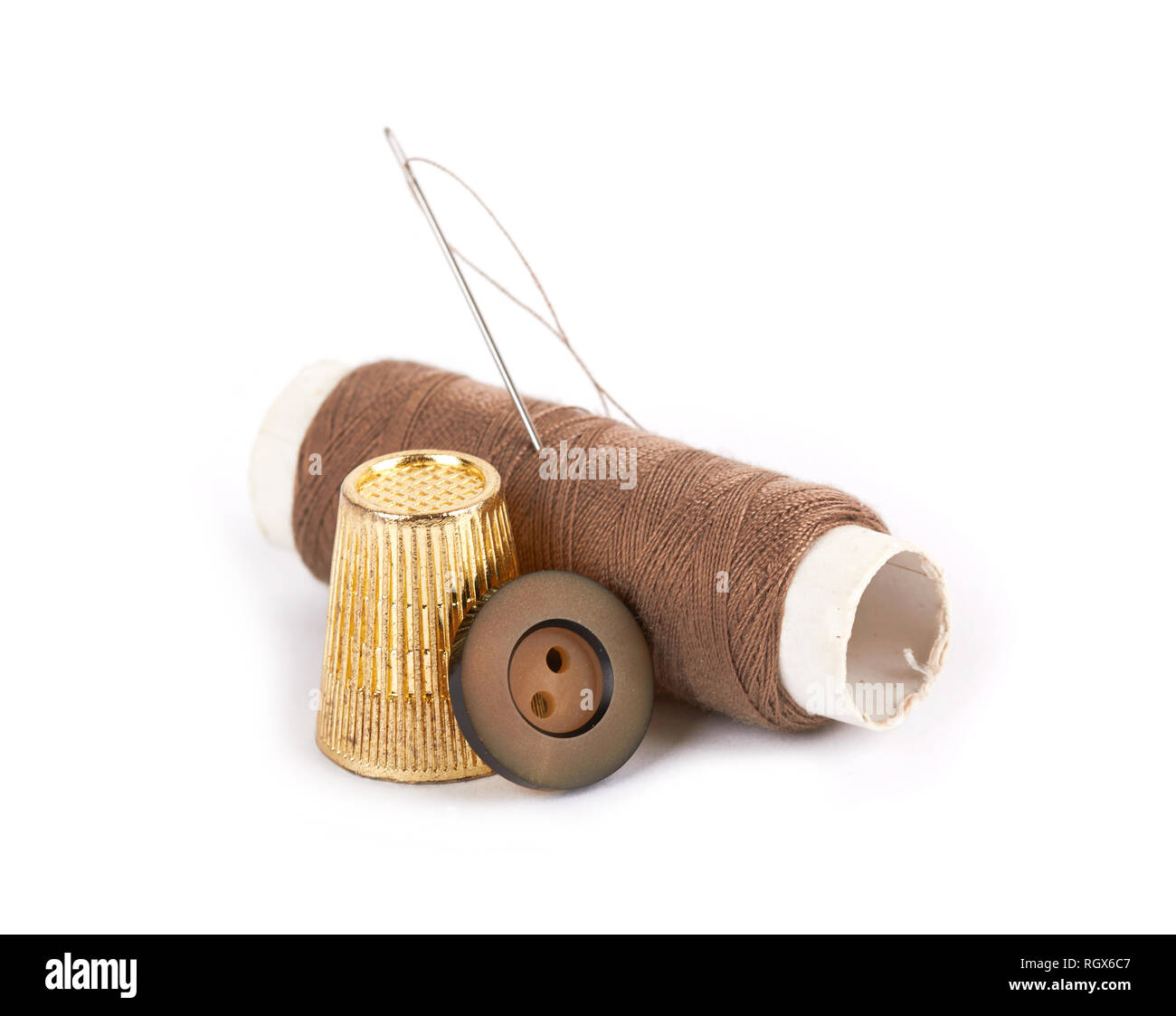 thread, needle, button and thimble on isolate white background Stock ...