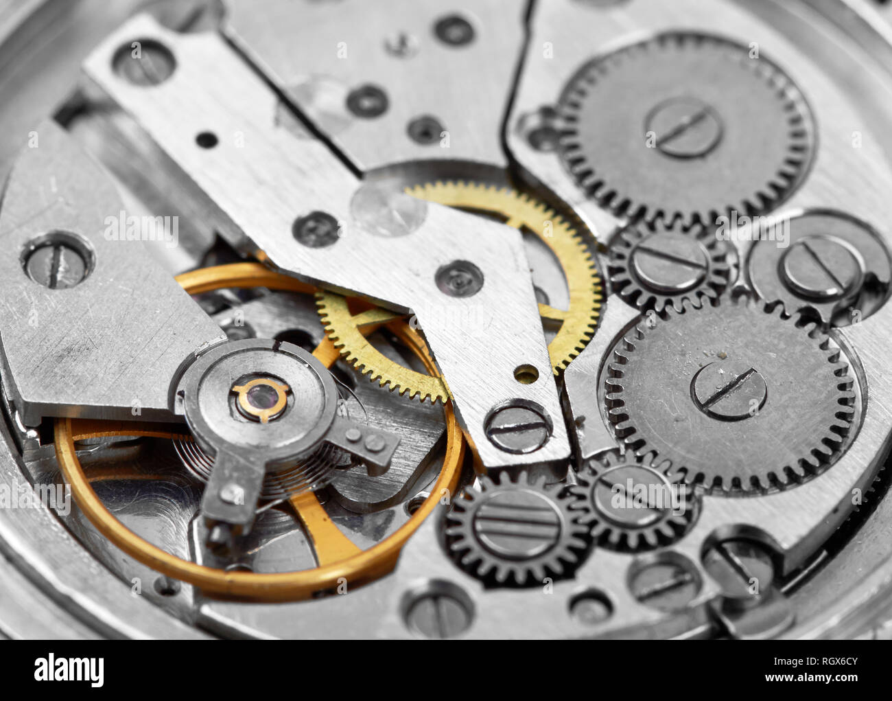 Clock mechanism with gears macro Stock Photo - Alamy