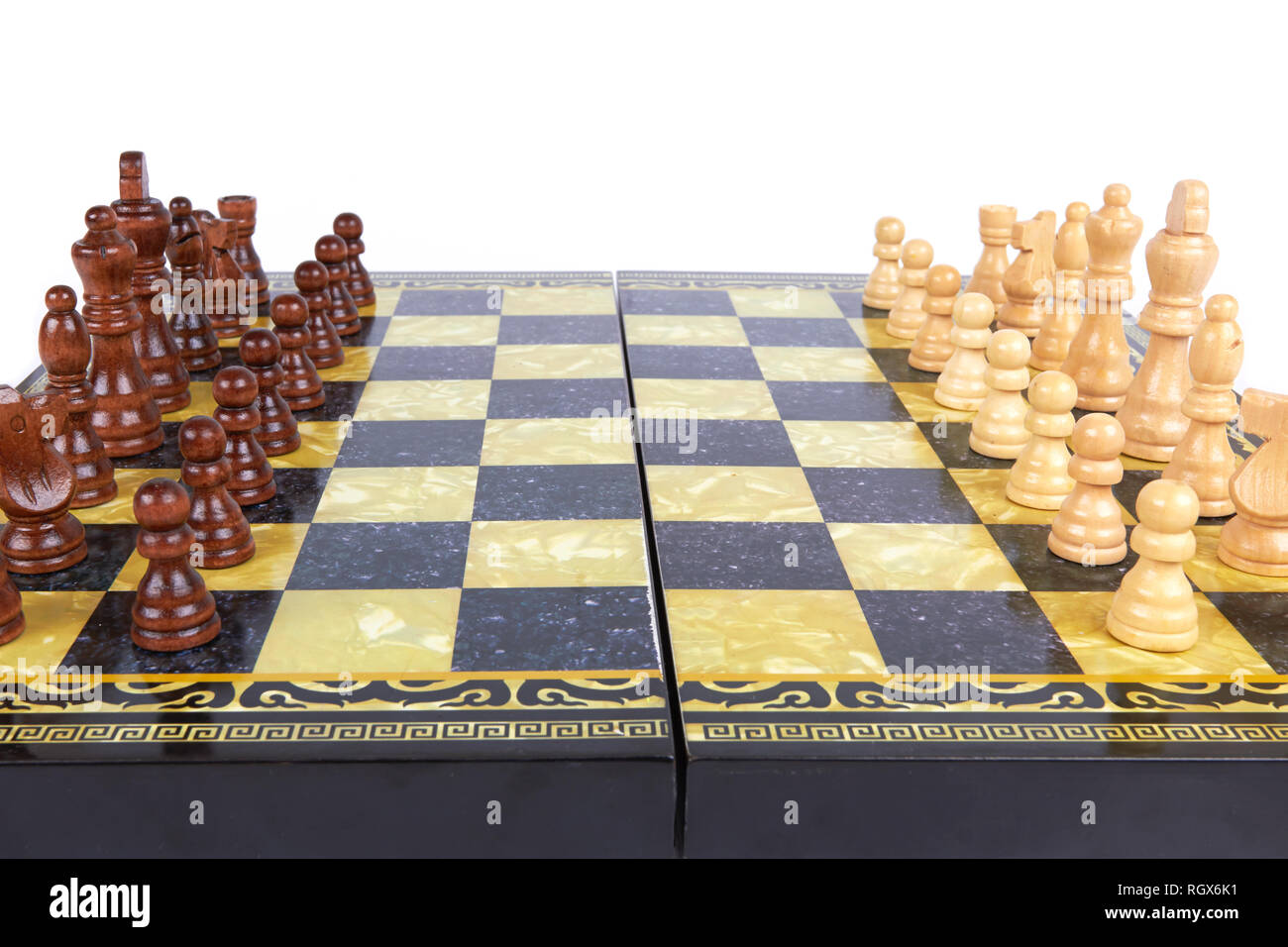 Chess board set up to begin a game. Isolated on white background Stock ...