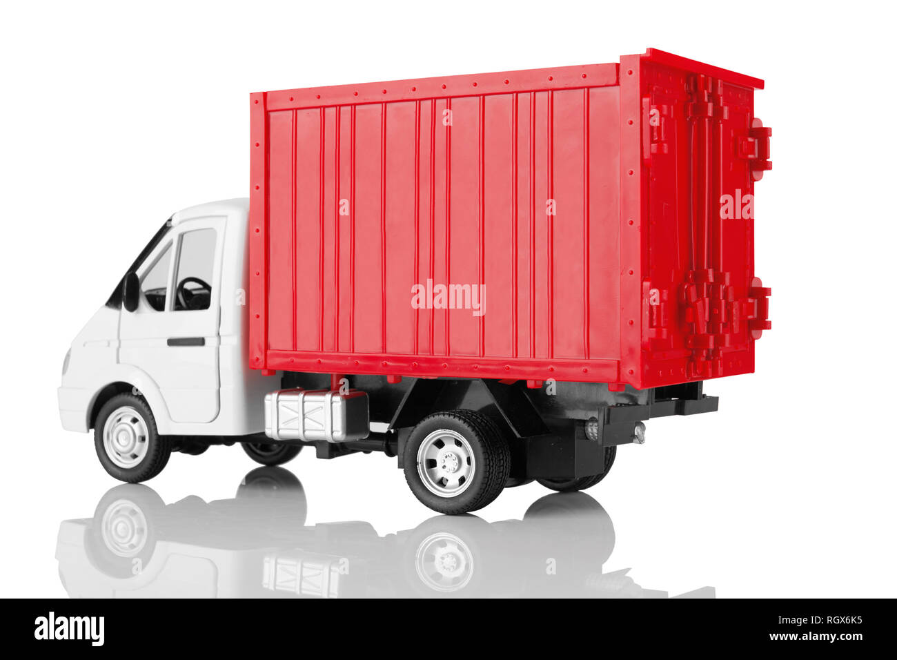 Toy red truck isolated on a white background Stock Photo - Alamy