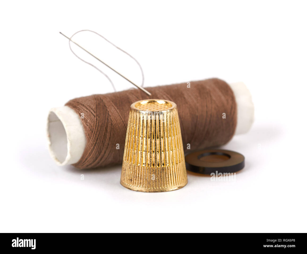 thread, needle, button and thimble on isolate white background Stock ...