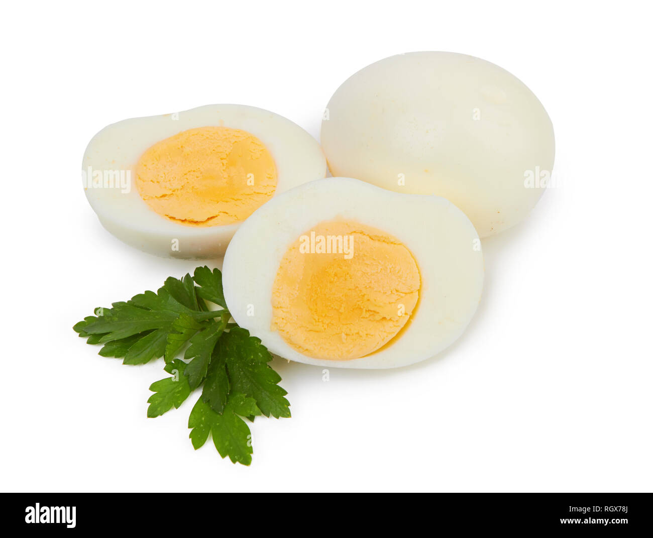 halves of a boiled egg isolated on white background Stock Photo - Alamy