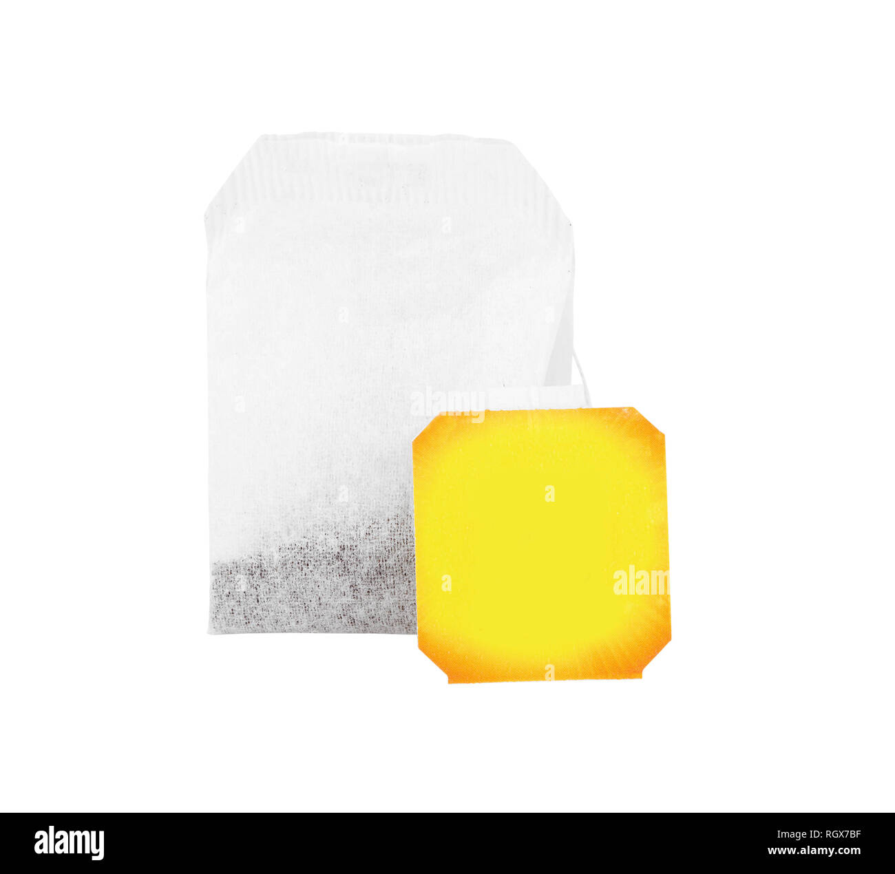 Teabag with yellow label isolated on white background Stock Photo - Alamy