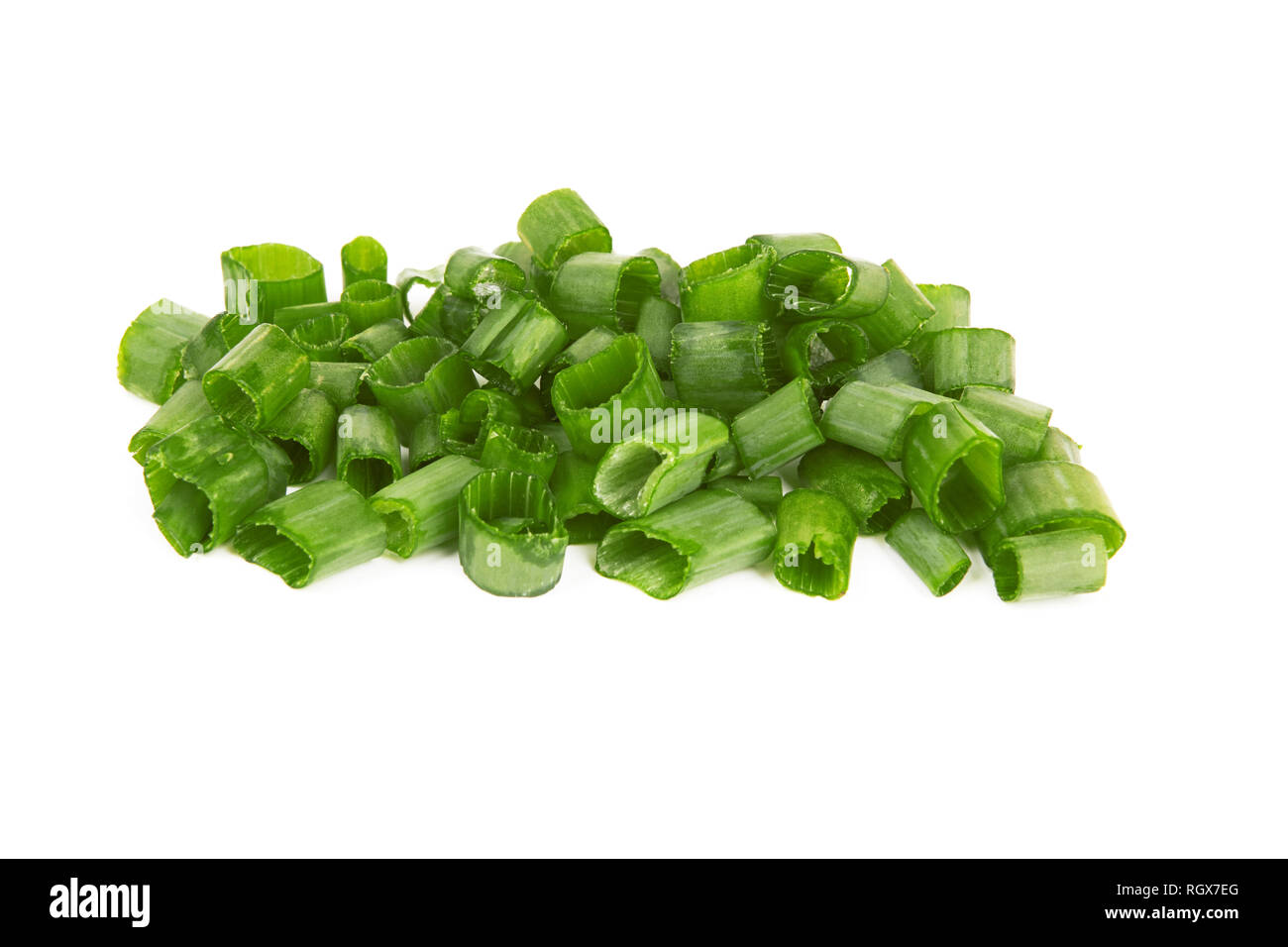 close up image of chopped spring onions on a white background Stock ...
