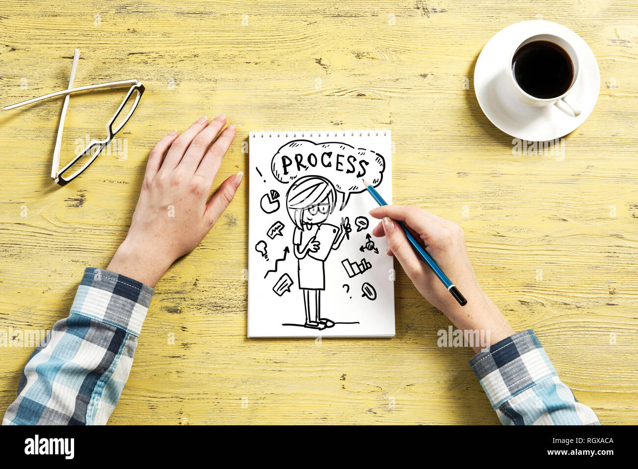 Hands of young woman drawing in notepad Stock Photo - Alamy