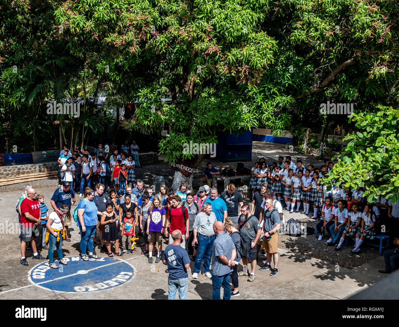 missionaries praying at collage in Guatemala Stock Photo - Alamy