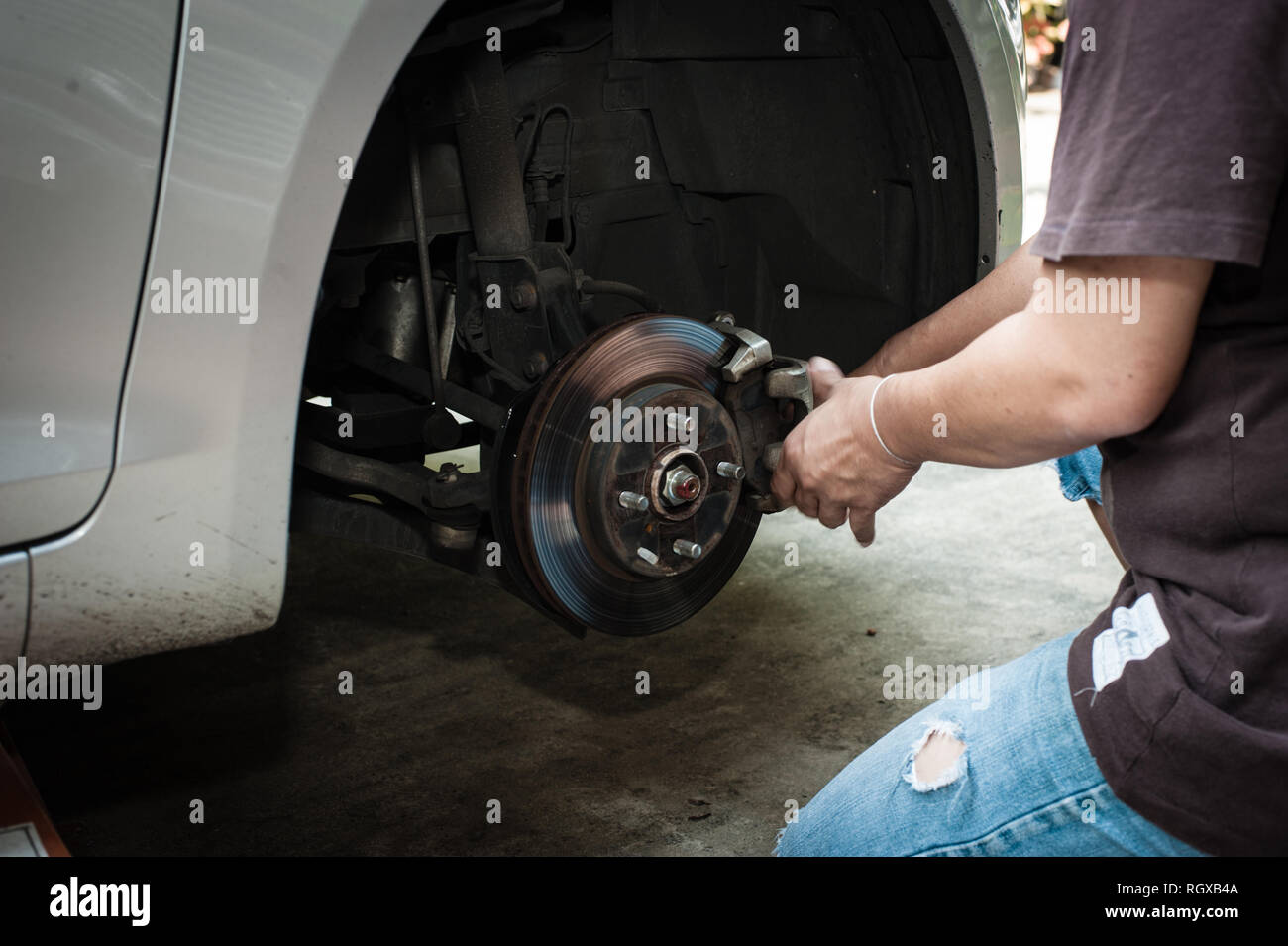 Car mechanic service brake system Stock Photo - Alamy