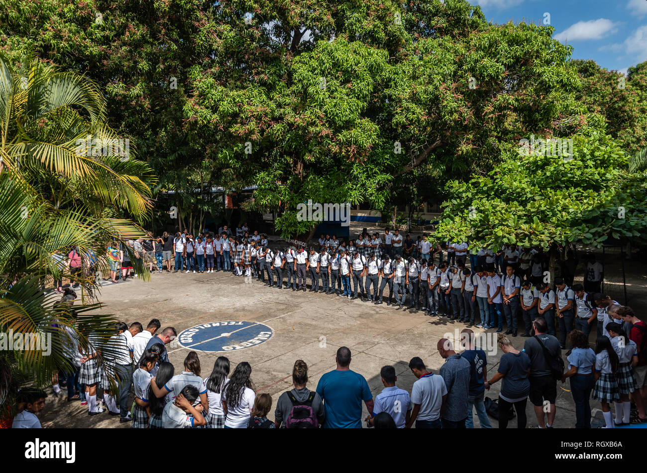 missionaries praying at collage in Guatemala Stock Photo - Alamy