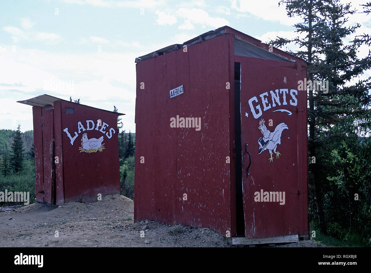 Outdoor pit toilets for men and women in Chicken,Alaska Stock Photo - Alamy