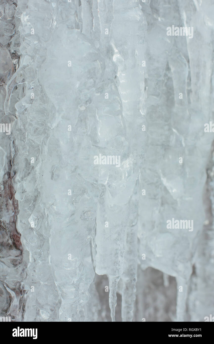 Very large and dangerous icicles close up in winter Stock Photo - Alamy
