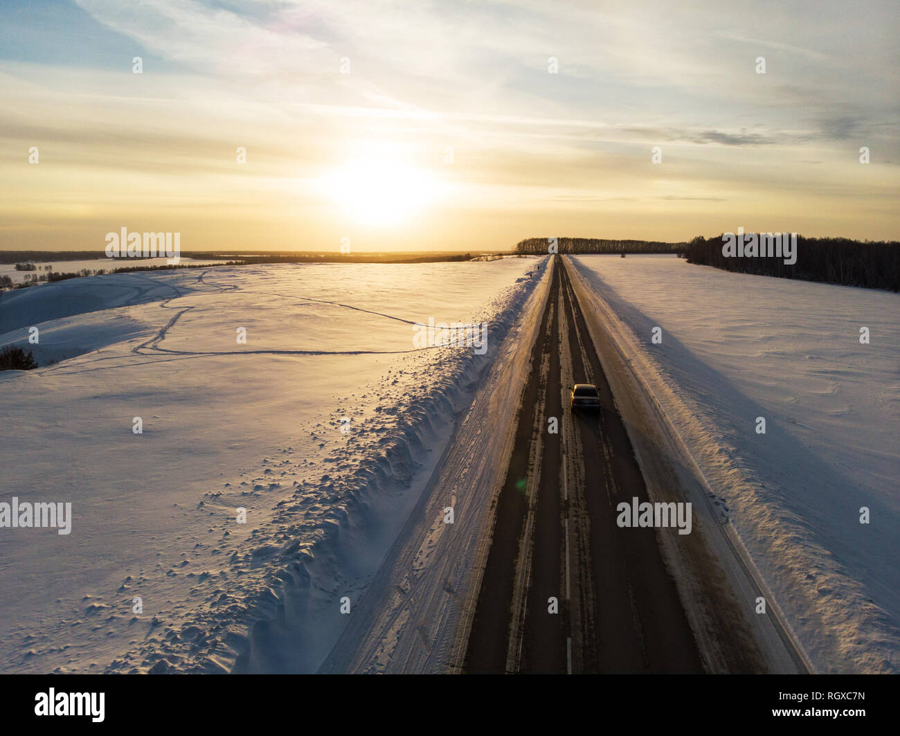 Aerial flying over snowy forest hi-res stock photography and images - Alamy