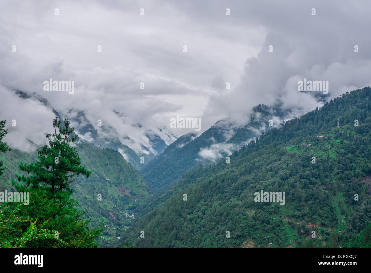 Photo of Tropical mountain range view. Timelapse Of Moving Clouds And ...