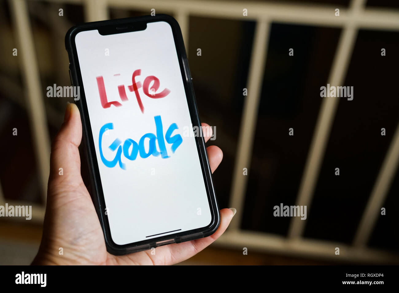 Smart phone with text, Life Goals written on it Stock Photo - Alamy