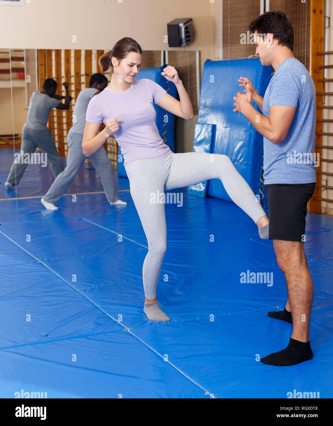 Adult people practicing effective techniques of self-defence in ...