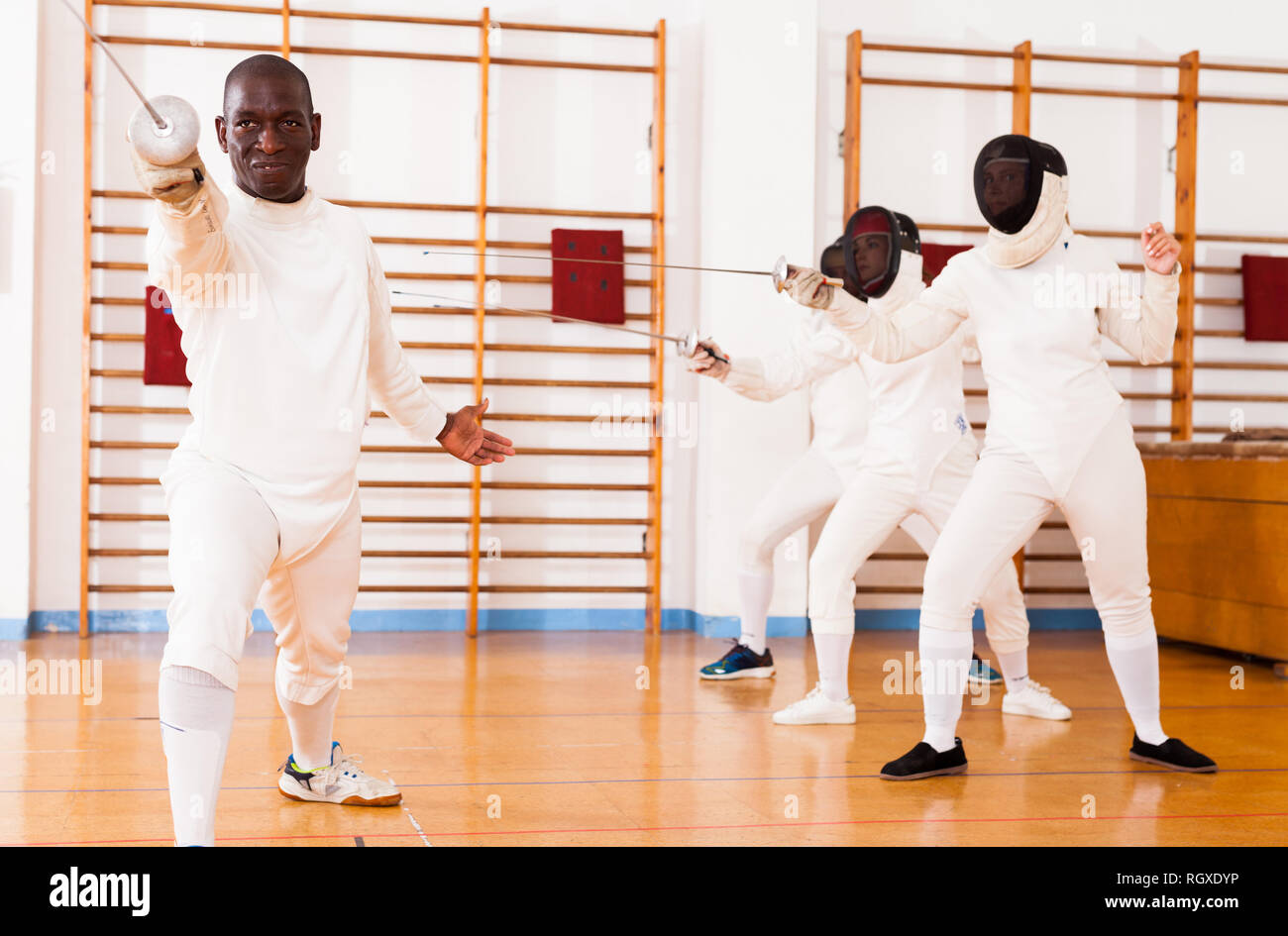 Sporty african american man fencer practicing effective fencing ...