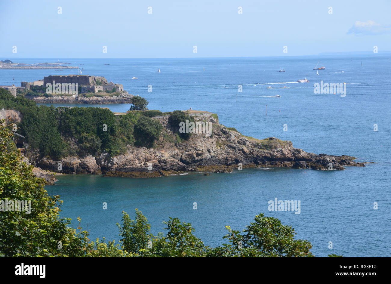 Castle Cornet in Havelet Bay and Clarence Battery from Soldiers Bay ...
